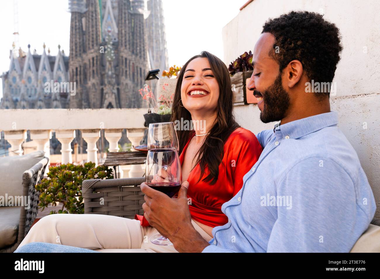 Multiracial beautiful happy couple of lovers dating on rooftop balcony ...