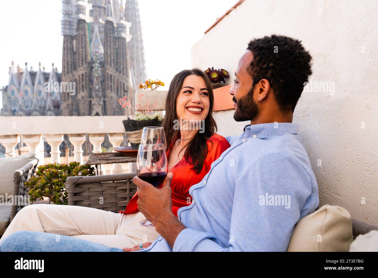 Multiracial beautiful happy couple of lovers dating on rooftop balcony ...