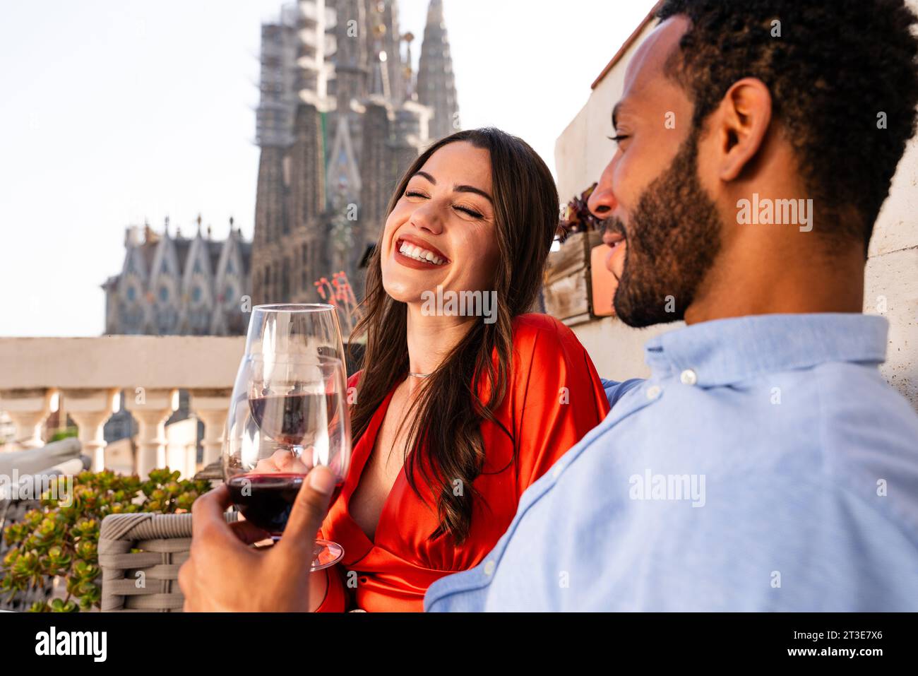 Multiracial beautiful happy couple of lovers dating on rooftop balcony ...