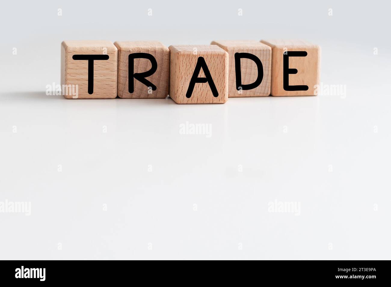 Trade symbol. Wooden cubes with word Trade. Beautiful white background ...