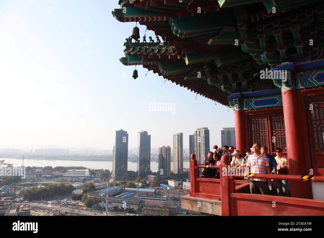Tourists visit the Yuejiang Tower in Nanjing City, east China's Jiangsu ...