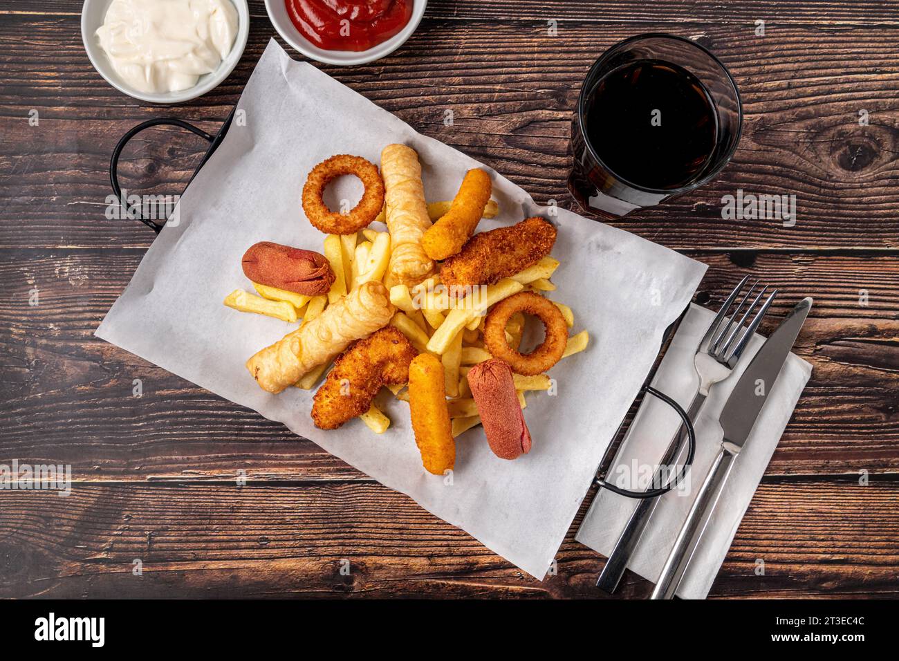 Snack plate with french fries, crispy chicken, cheese sticks, sausage ...