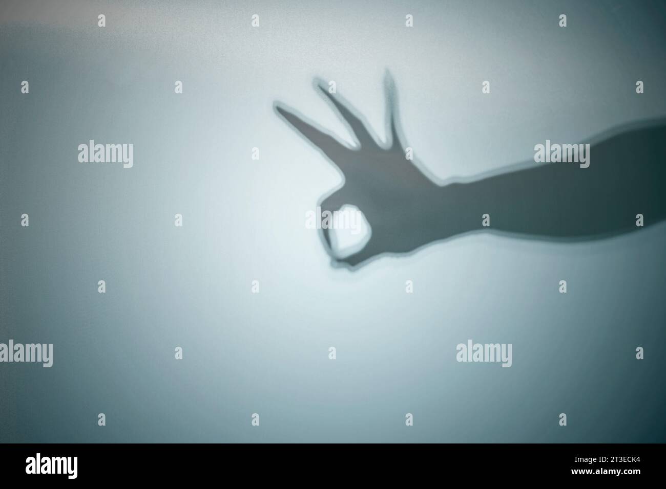 Shadow of a zombie's hand on a colored background. Scary Halloween ...