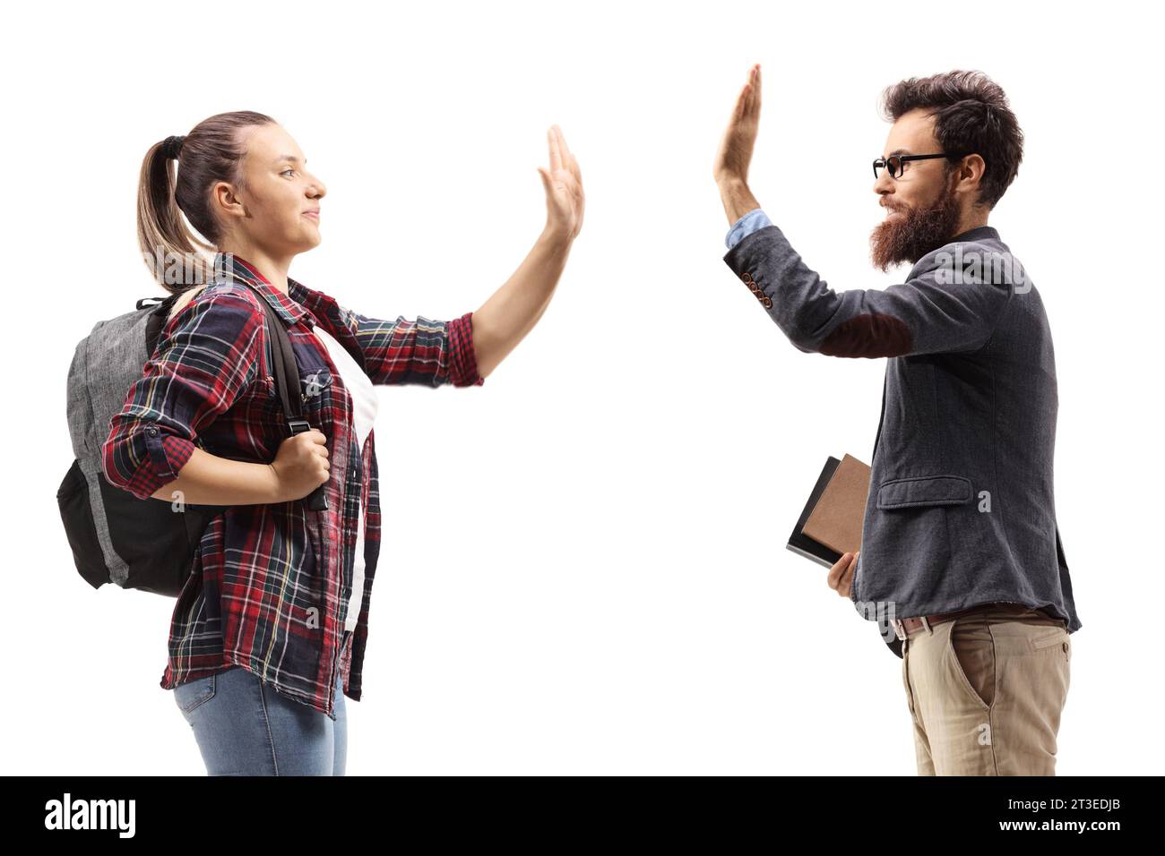 Female student gesturing high-five with a teacher isolated on white ...
