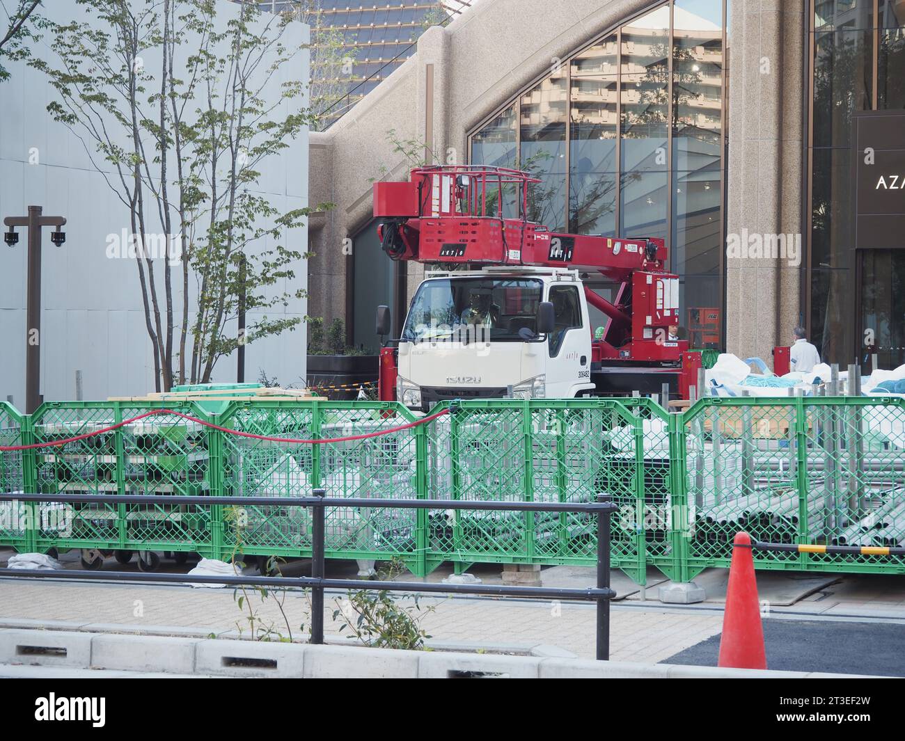 TOKYO, JAPAN - 22 October, 2023: A crane truck on the construction site the Azabudai Hills ...