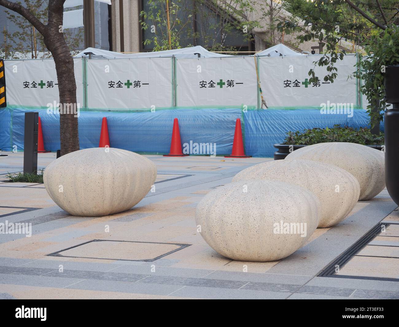TOKYO, JAPAN - 22 October, 2023: Stone seating in the Azabudai Hills development being built in ...