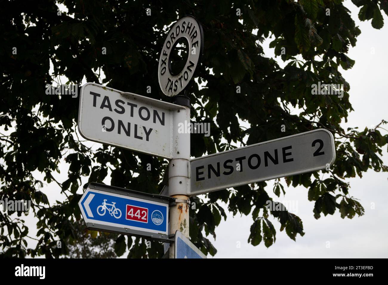 Road signs at Taston, Oxfordshire, England, UK Stock Photo - Alamy