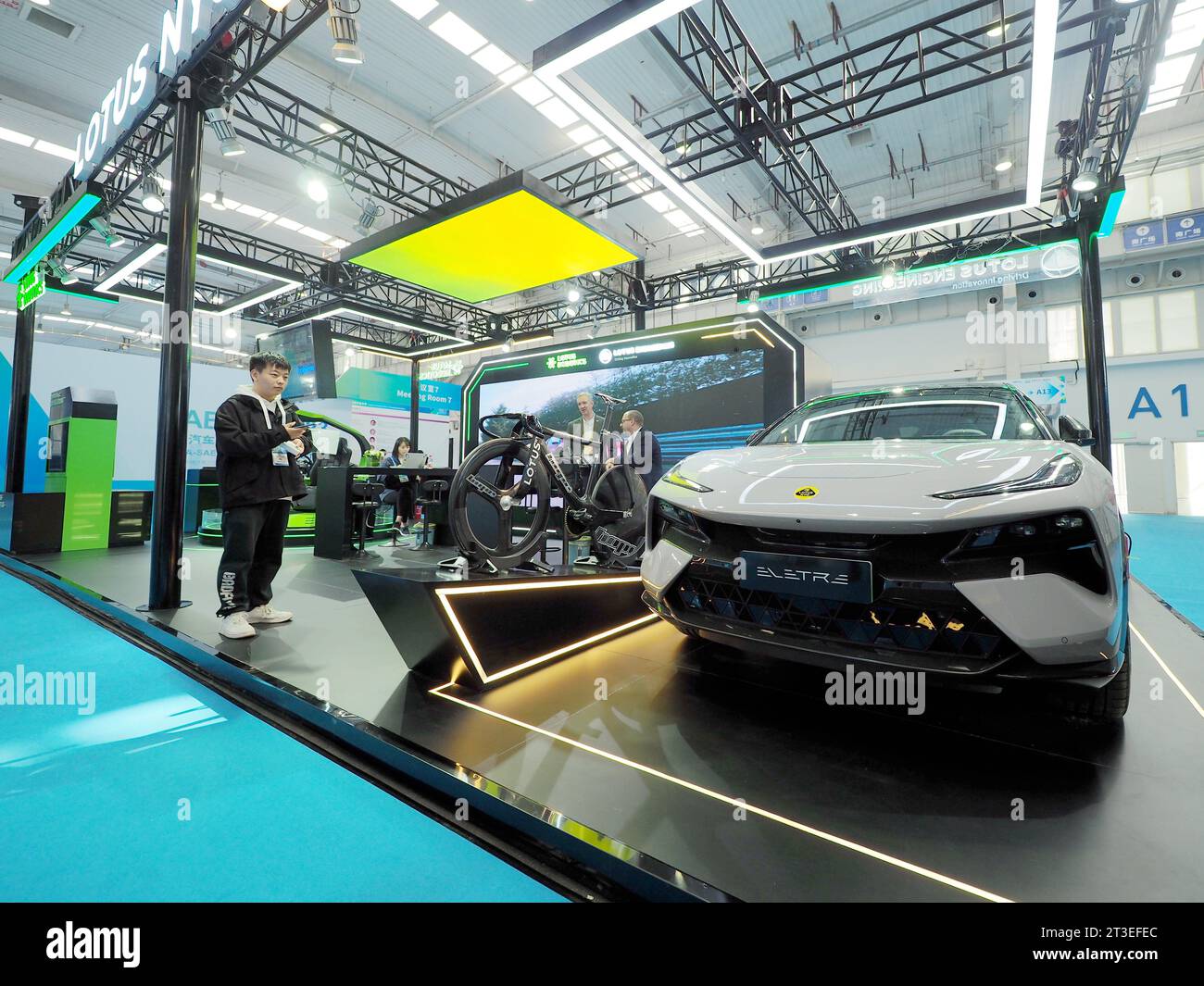BEIJING, CHINA - OCTOBER 25, 2023 - Visitors visit the booth of Lotus ...