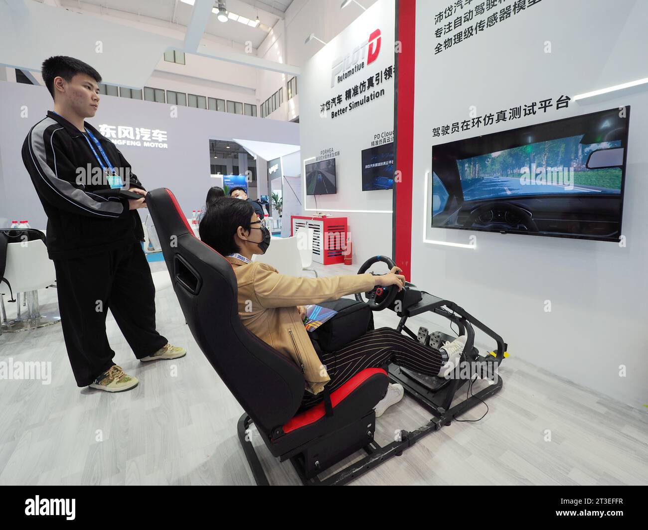 BEIJING, CHINA - OCTOBER 25, 2023 - Visitors experience a driver in the ...