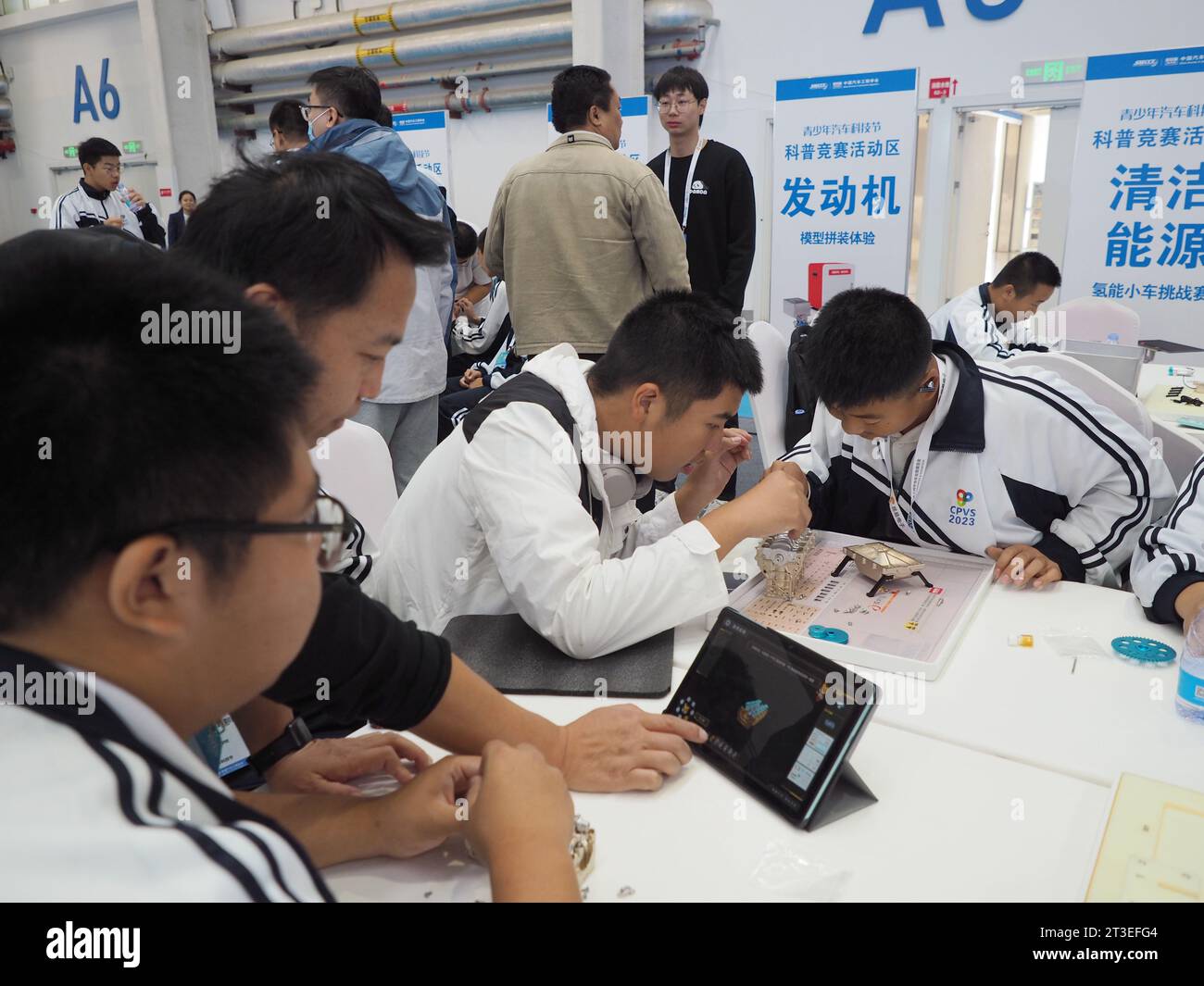 BEIJING, CHINA - OCTOBER 25, 2023 - Students have an engine model ...
