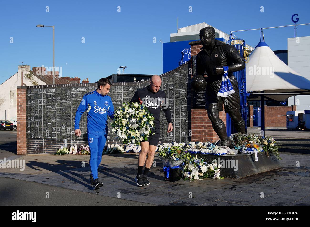 Everton captain Seamus Coleman and manager Sean Dyche lay flowers by ...