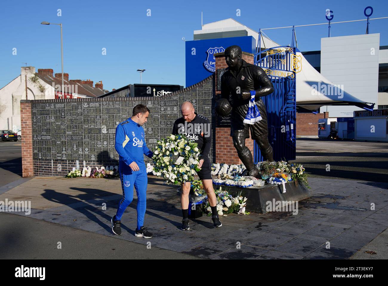 Everton captain Seamus Coleman and manager Sean Dyche lay flowers by ...