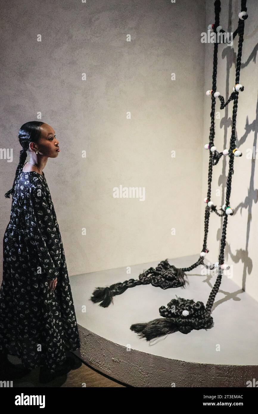 London, UK. 25th Oct, 2023. Model with 'We Climb', 2021, by Jennifer ...