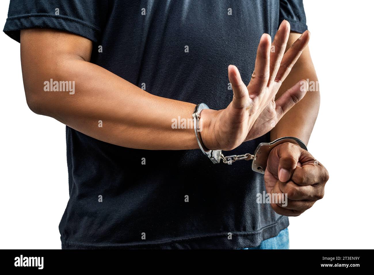 Arrested man with a handcuff on his hand isolated over a white ...