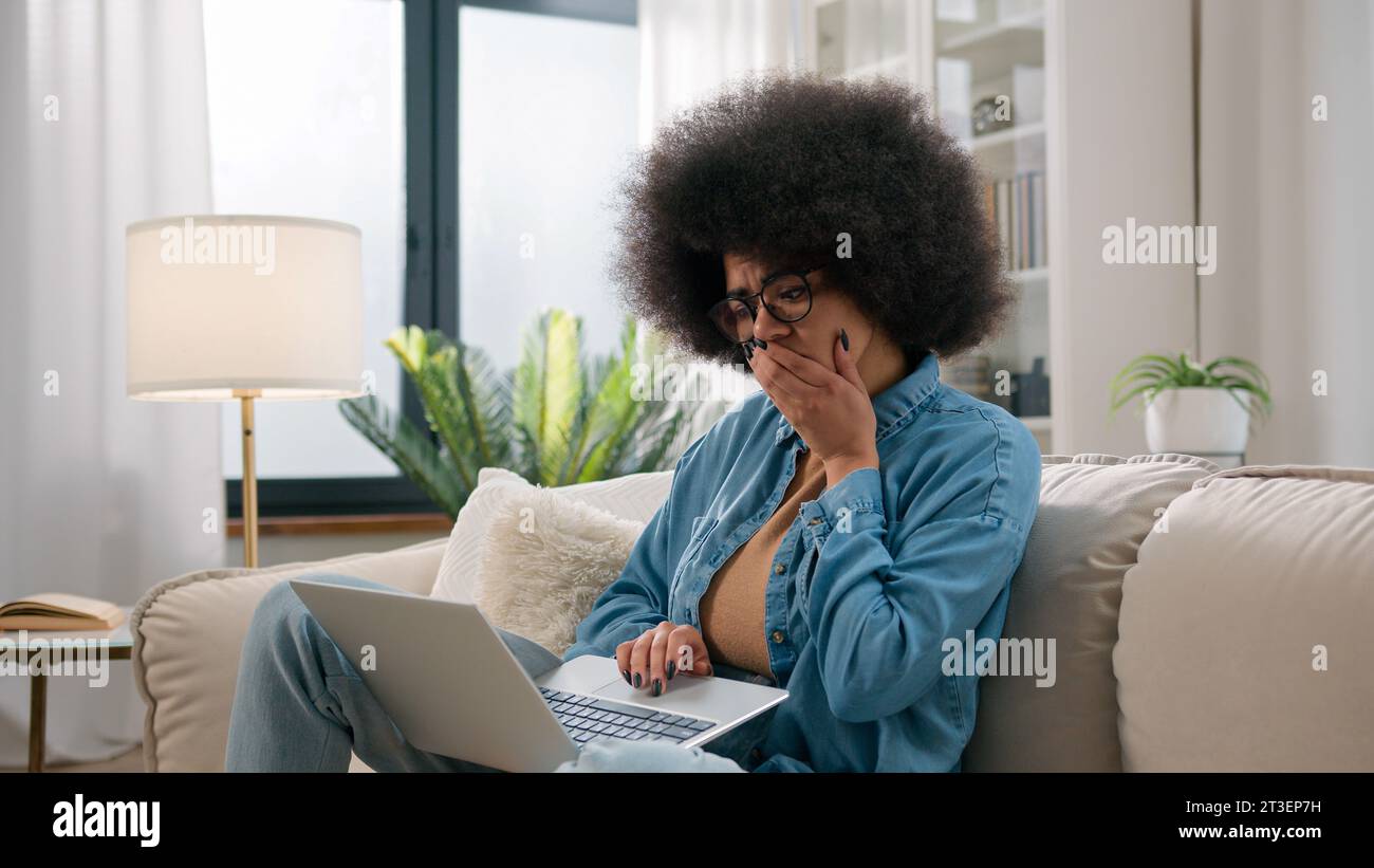 Worried African American woman stressed with laptop frustrated ...