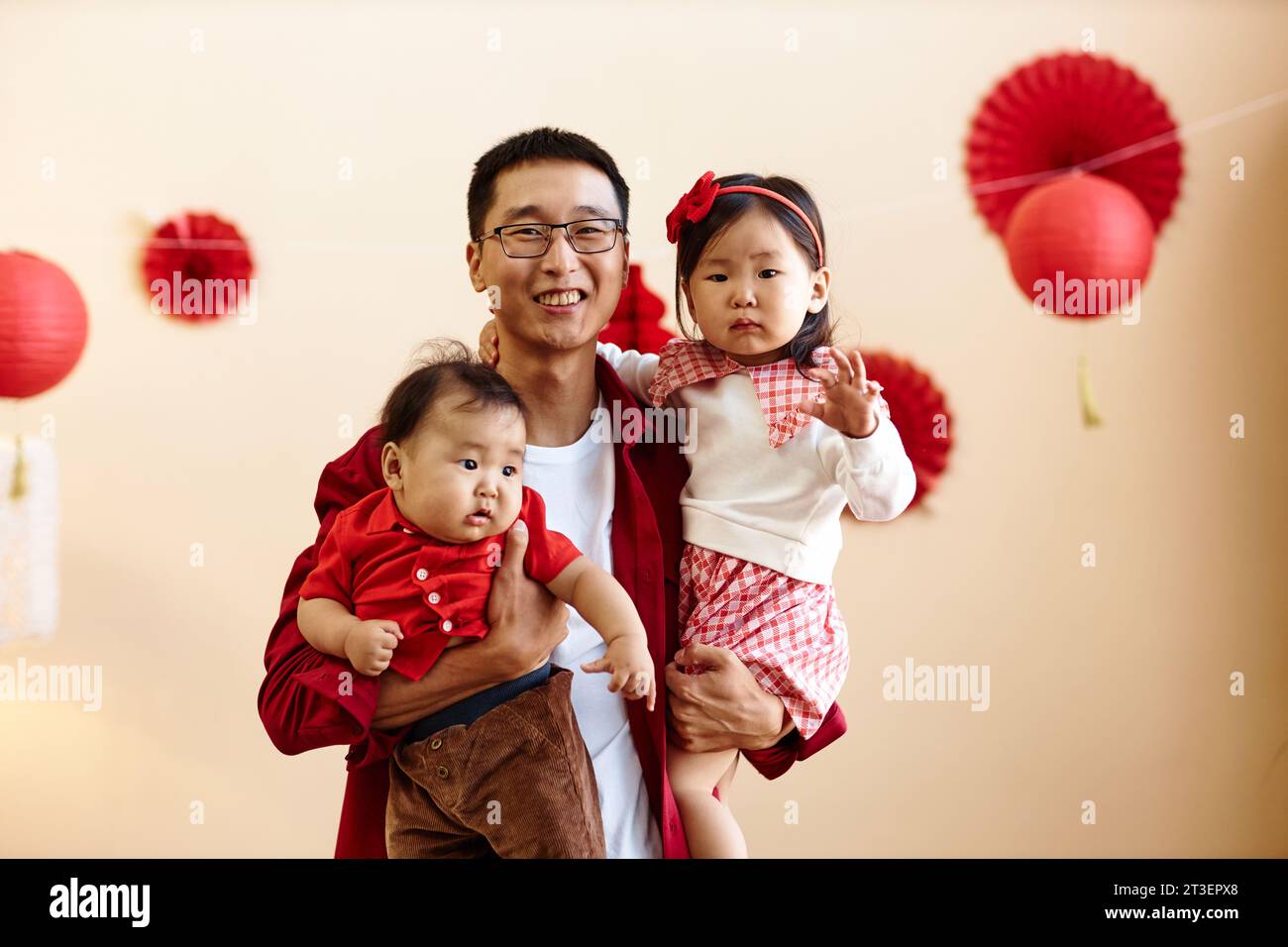 Chinese man hug daughter hi-res stock photography and images - Alamy