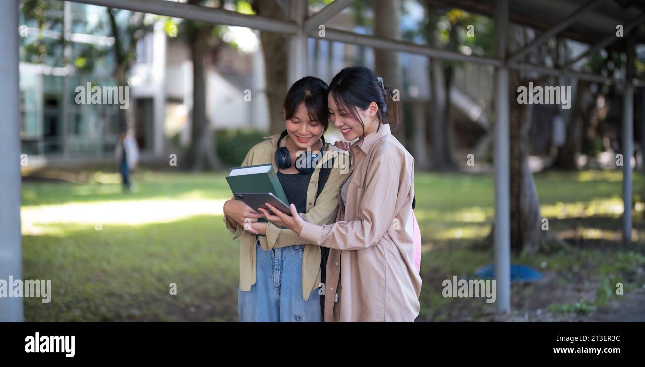 Happy young student chat with each other after class. Guy and girls ...