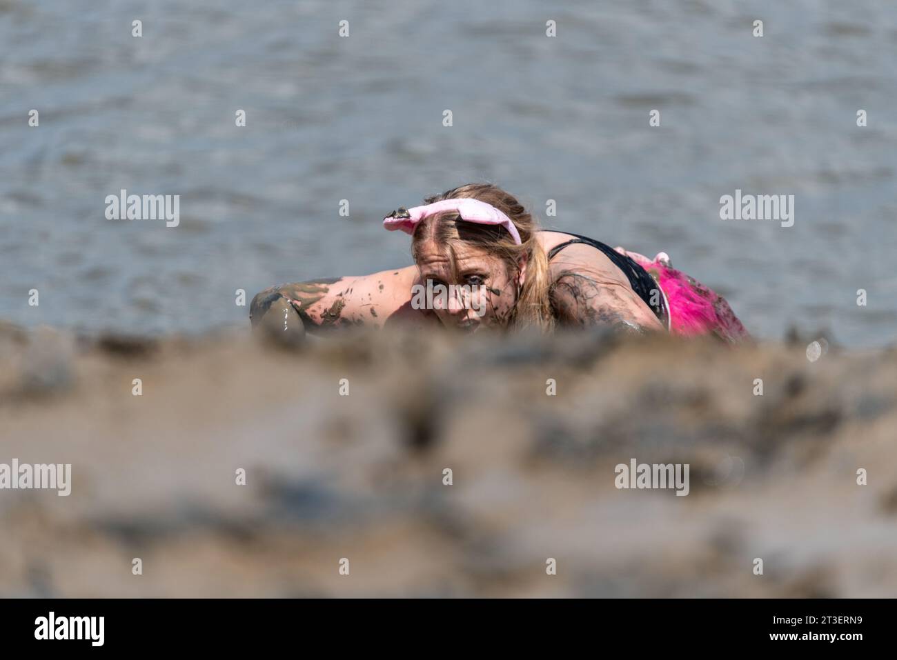 Woman covered in mud hi-res stock photography and images - Alamy