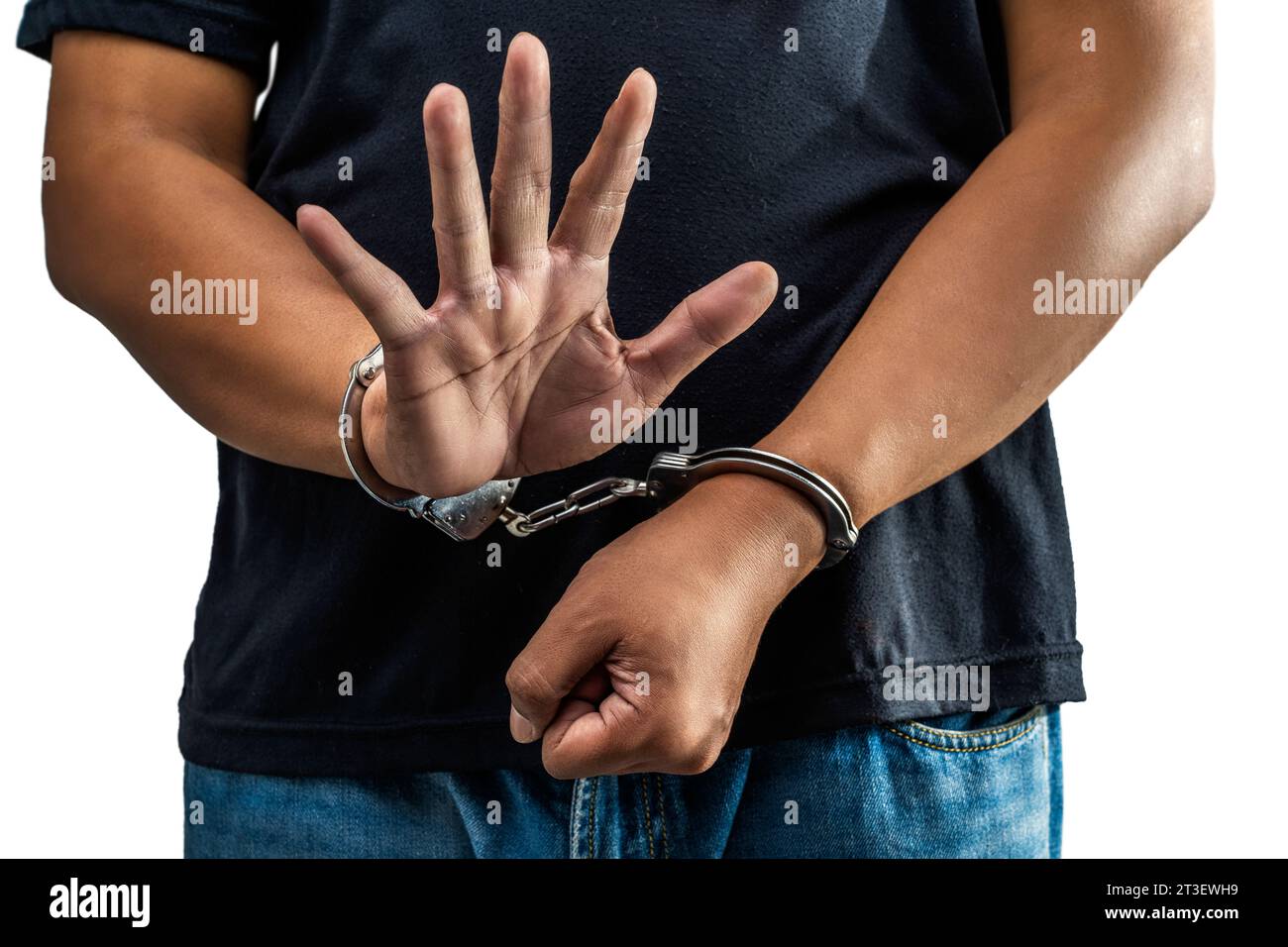 Arrested man with a handcuff on his hand isolated over a white ...