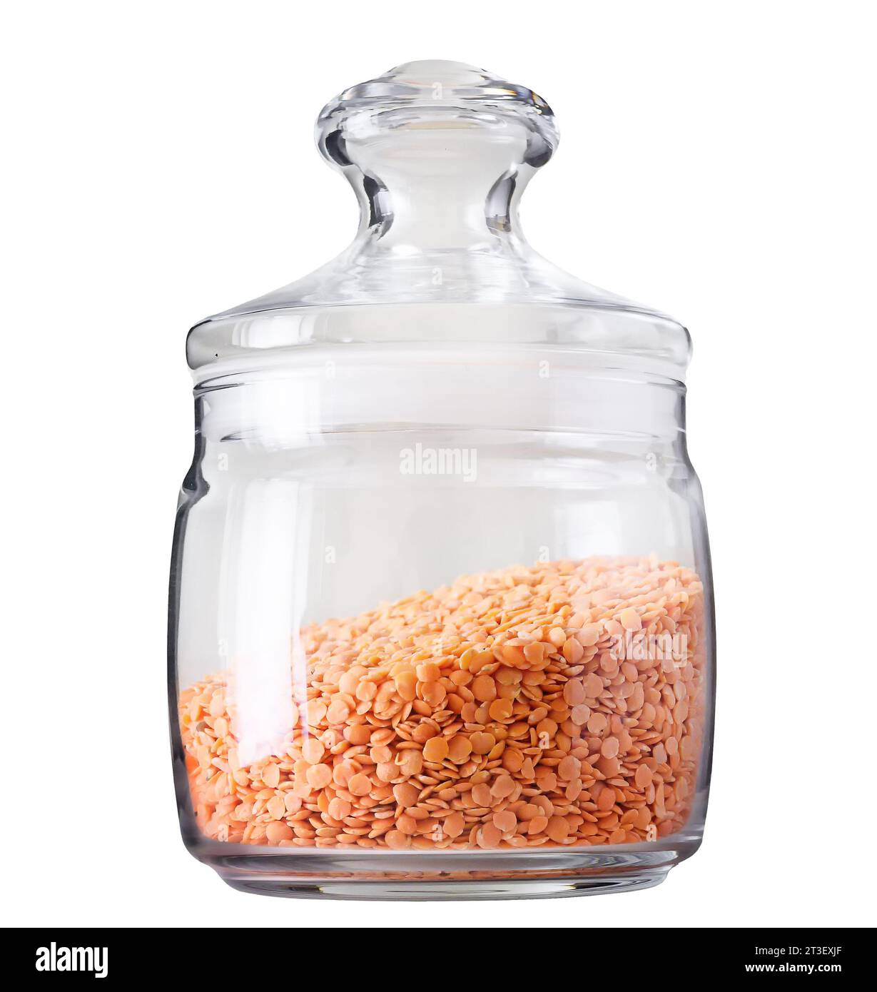 Raw red lentils in glass storage jar isolated on white background Stock ...