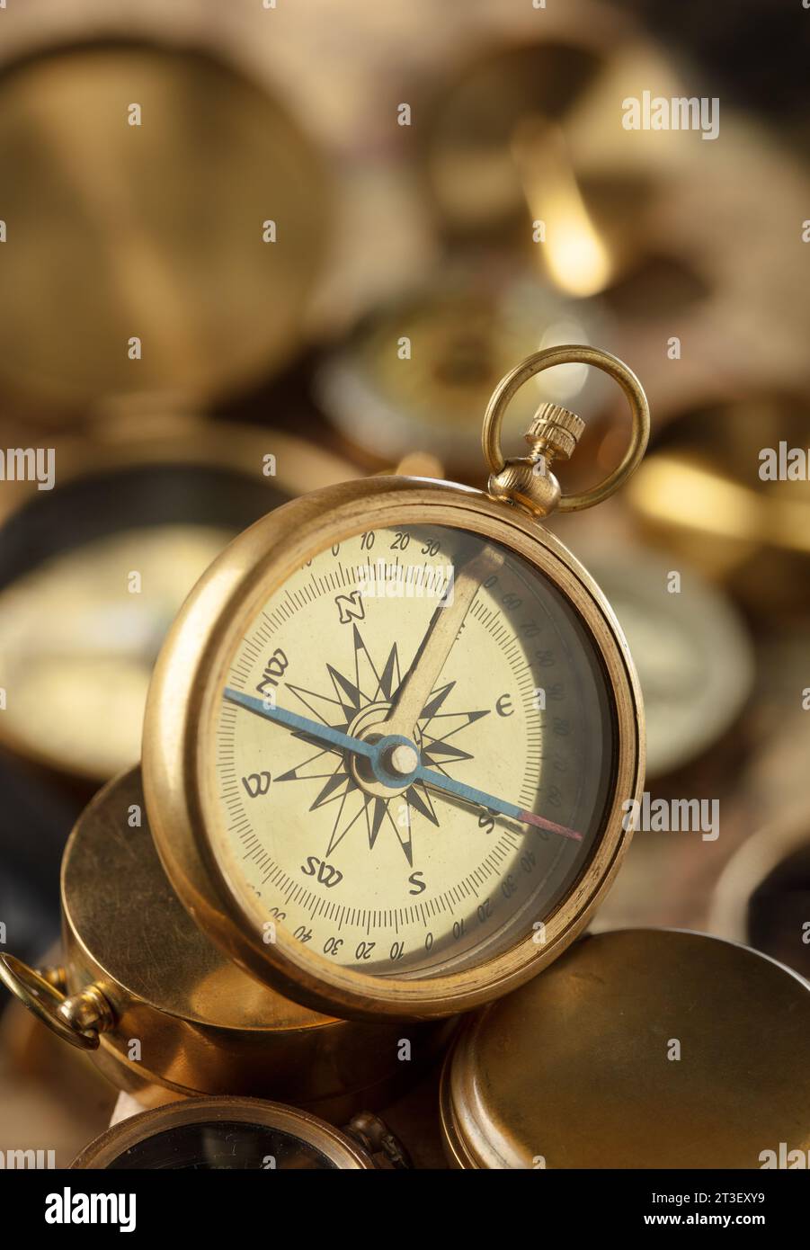 Close-up view of antique brass compass Stock Photo - Alamy