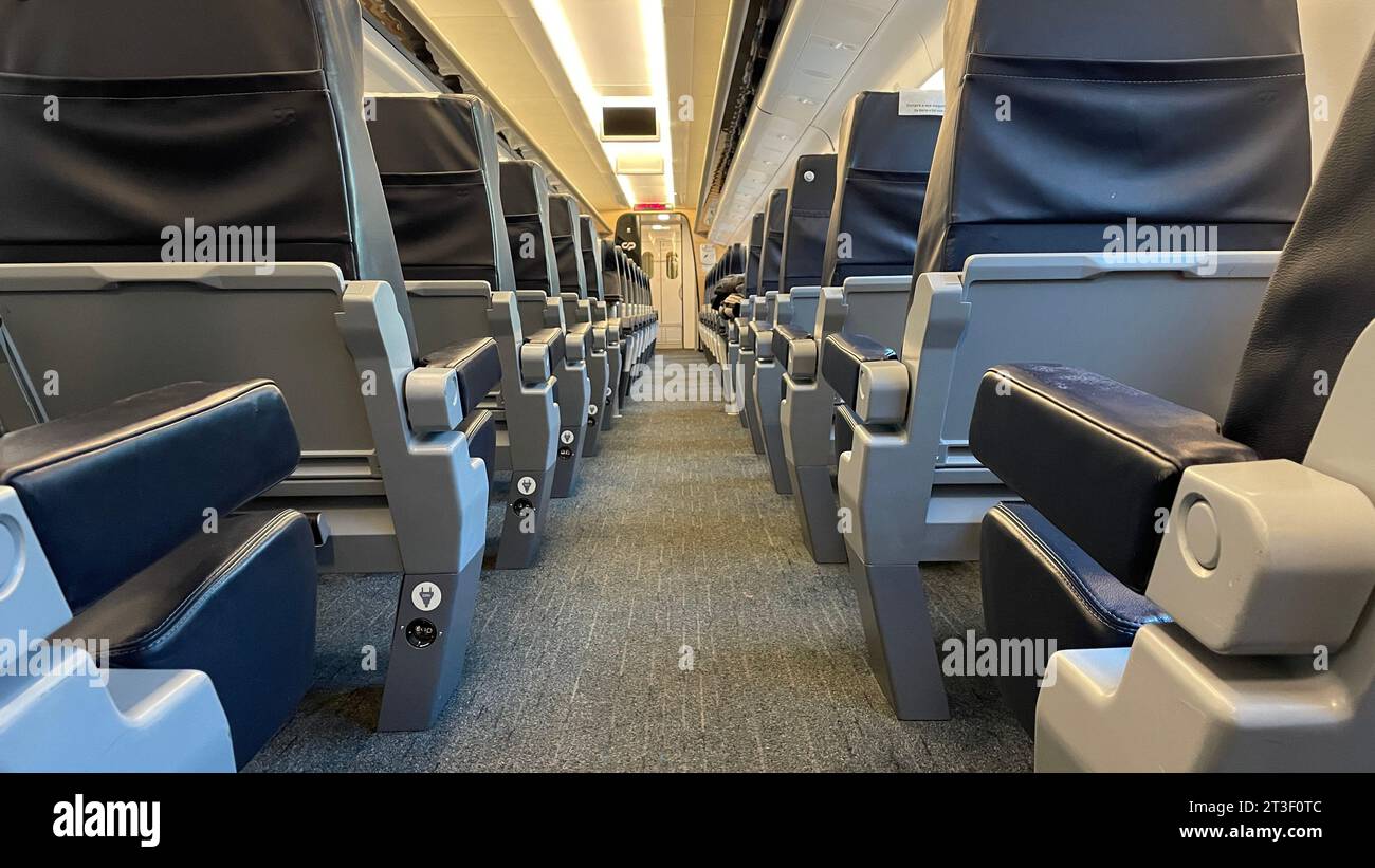 Interior of an empty first class cabin in a modern European train car ...
