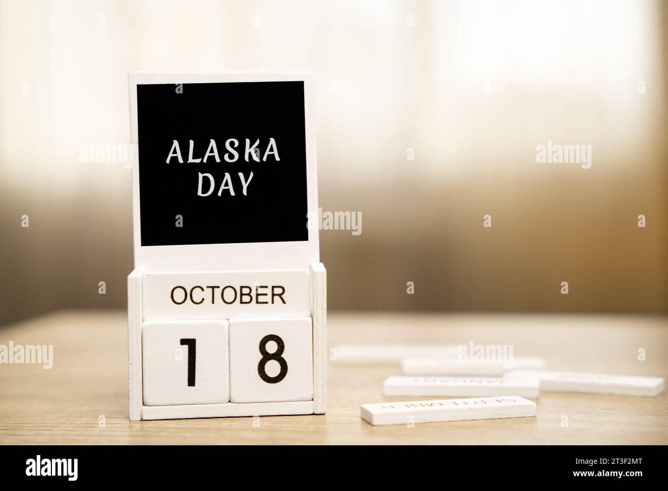 Calendar with words October 18 - Alaska Day in the U.S. state. Table ...
