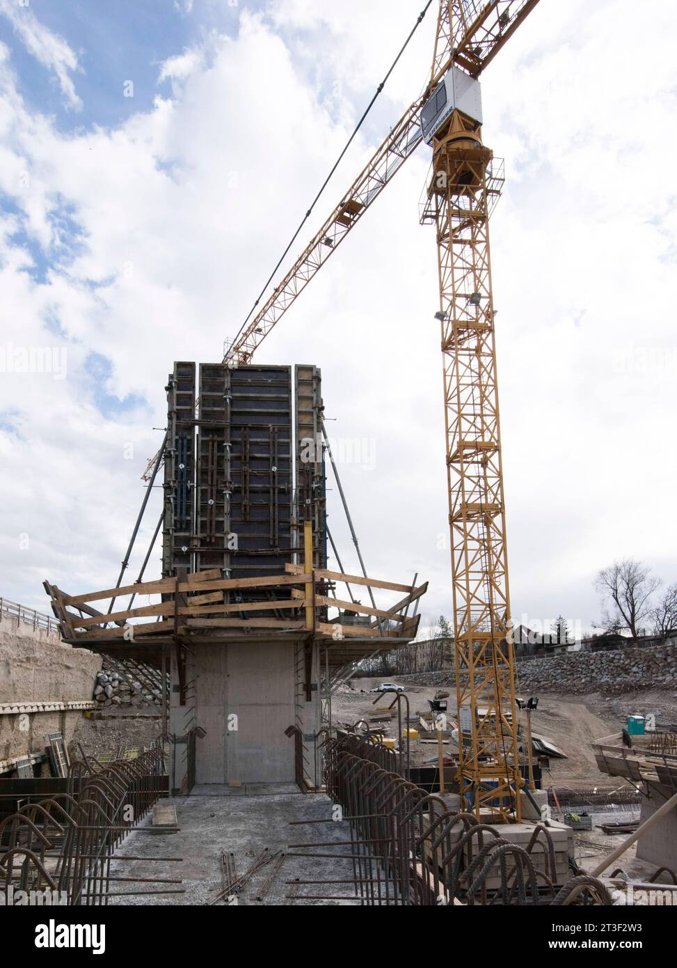 Construction crane in building industry, heavy machine at construction ...