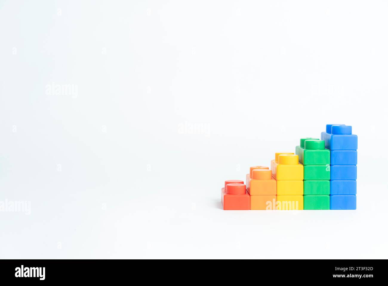 Many toy blocks in different colors on white background Stock Photo - Alamy