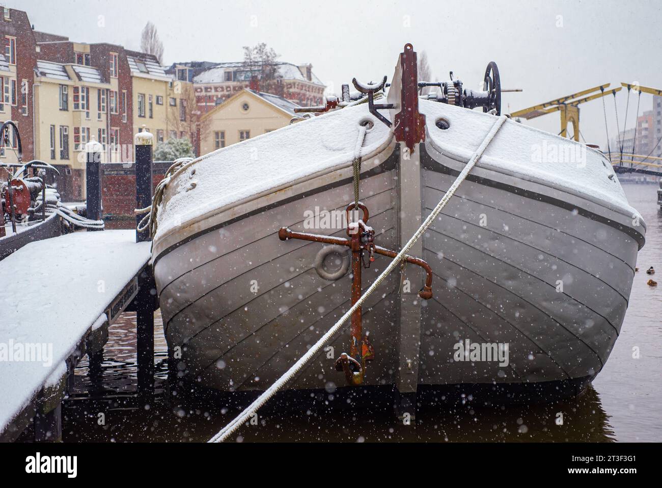 Traditional Dutch ships in harbour under the snow Stock Photo - Alamy