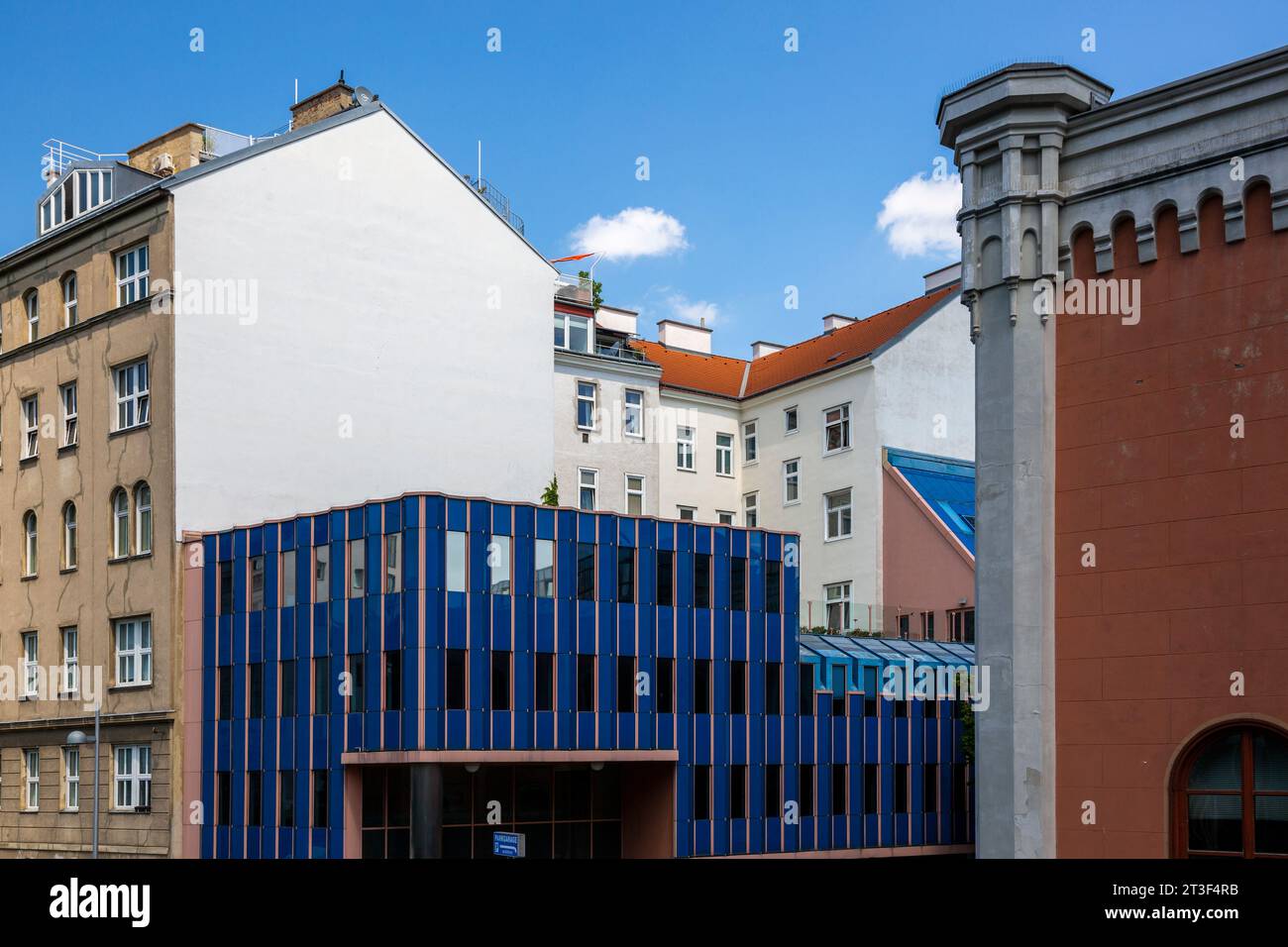 Fragments of facades of different buildings in one of the districts of ...