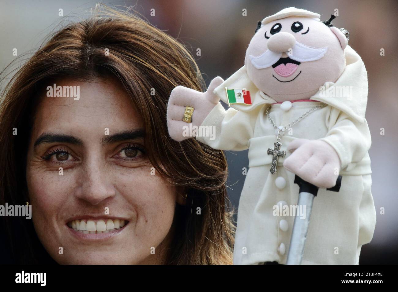 St Peter's Square, Vatican City. October 25, 2023 - Woman with puppet ...
