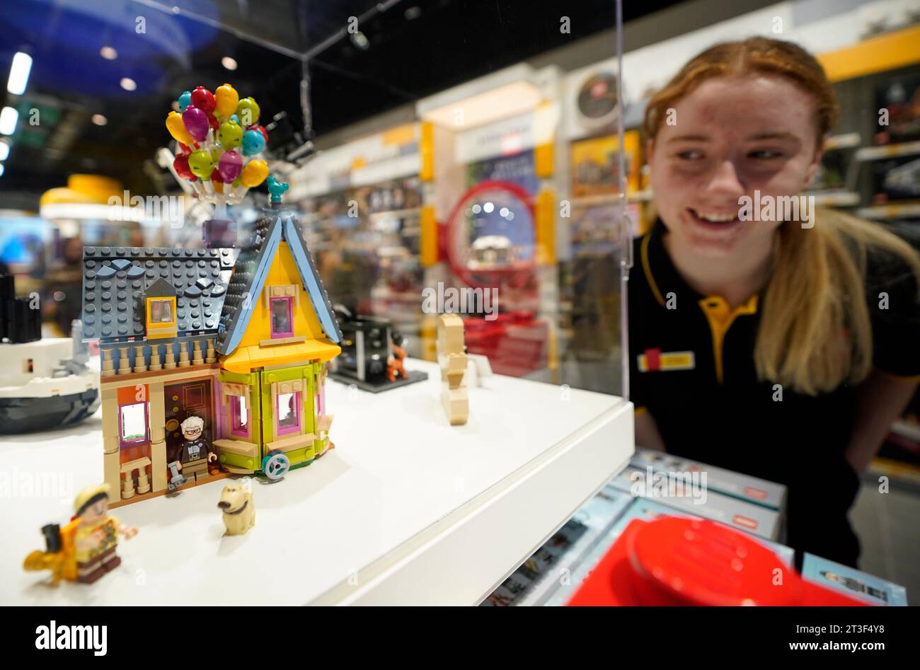 Staff member Oliwia Opala looks at the Up animated movie set during a media preview of the new ...