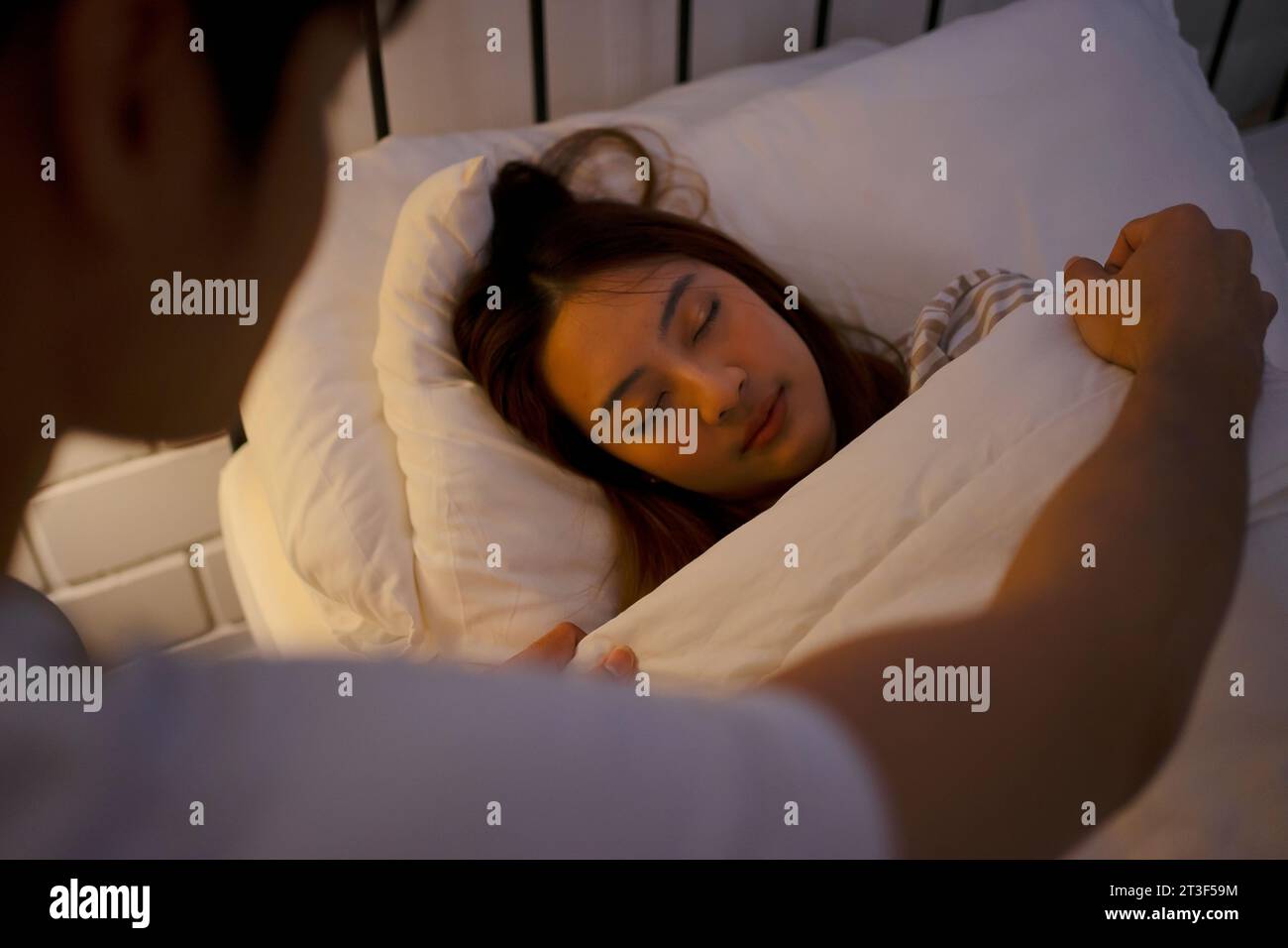 A Man Is Take Care Girlfriend At Night Couple And Care Concept Stock