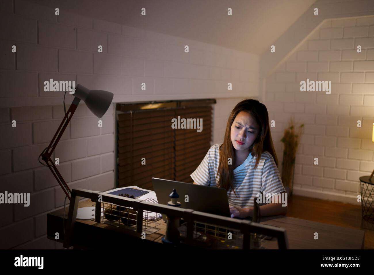 Asian woman working late night hi-res stock photography and images - Alamy