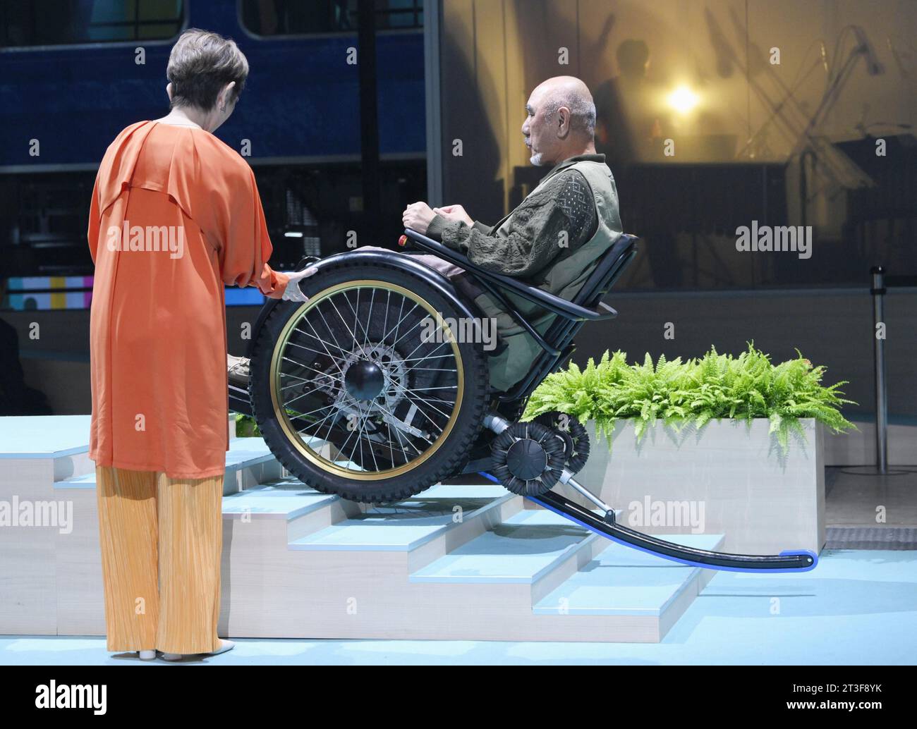 Toyota Motor Corp. shows its JUU electric wheelchair mobility that can ...