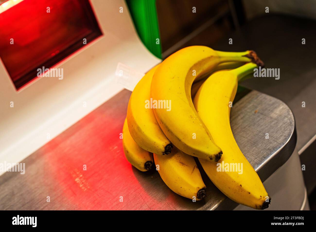 scan the barcode of bananas at the self-service checkout Stock Photo ...