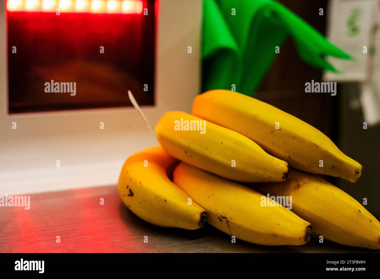 scan the barcode of bananas at the self-service checkout Stock Photo ...