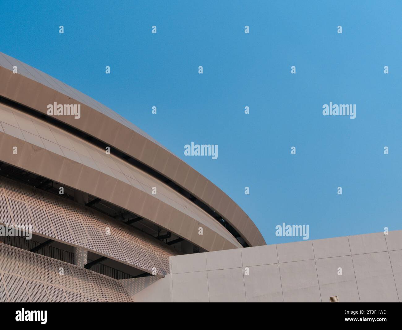 Minimalist image of Indonesian Arena building with blue sky Stock Photo ...