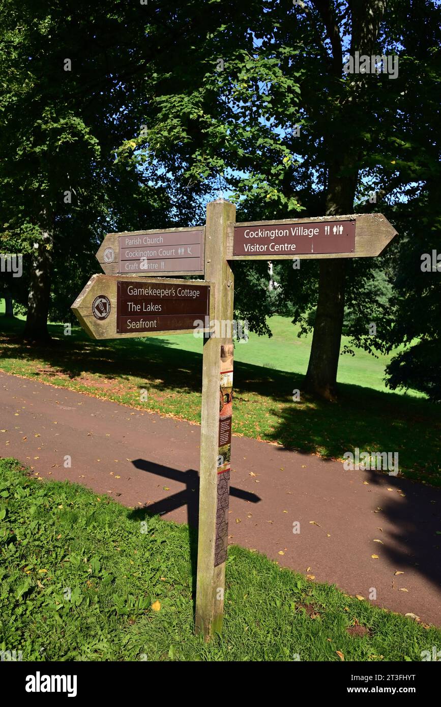 A footpath sign in Cockington Country Park, Torquay, South Devon Stock ...