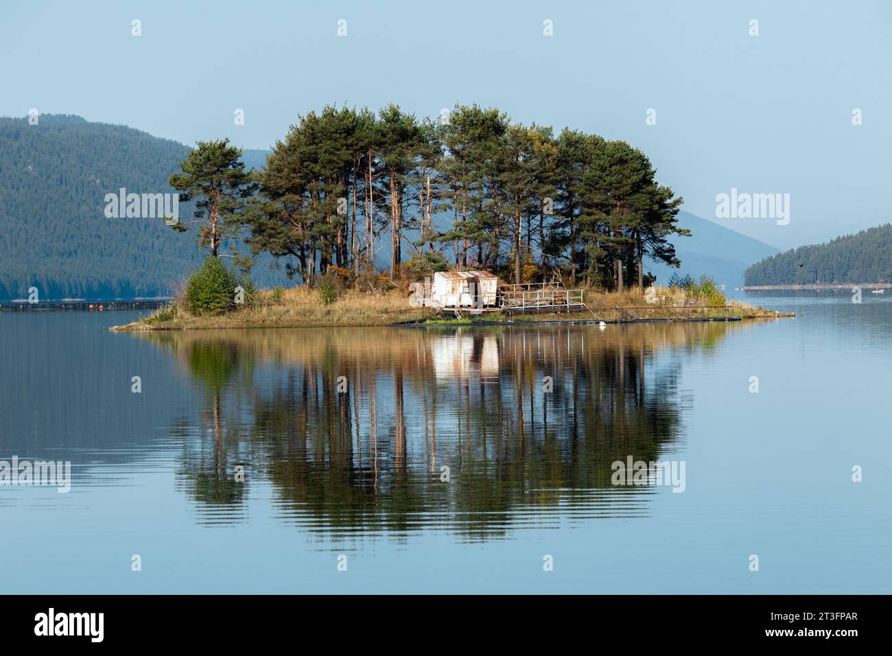 A small island in the middle of a big reservoir, Dospat, Bulgaria Stock ...