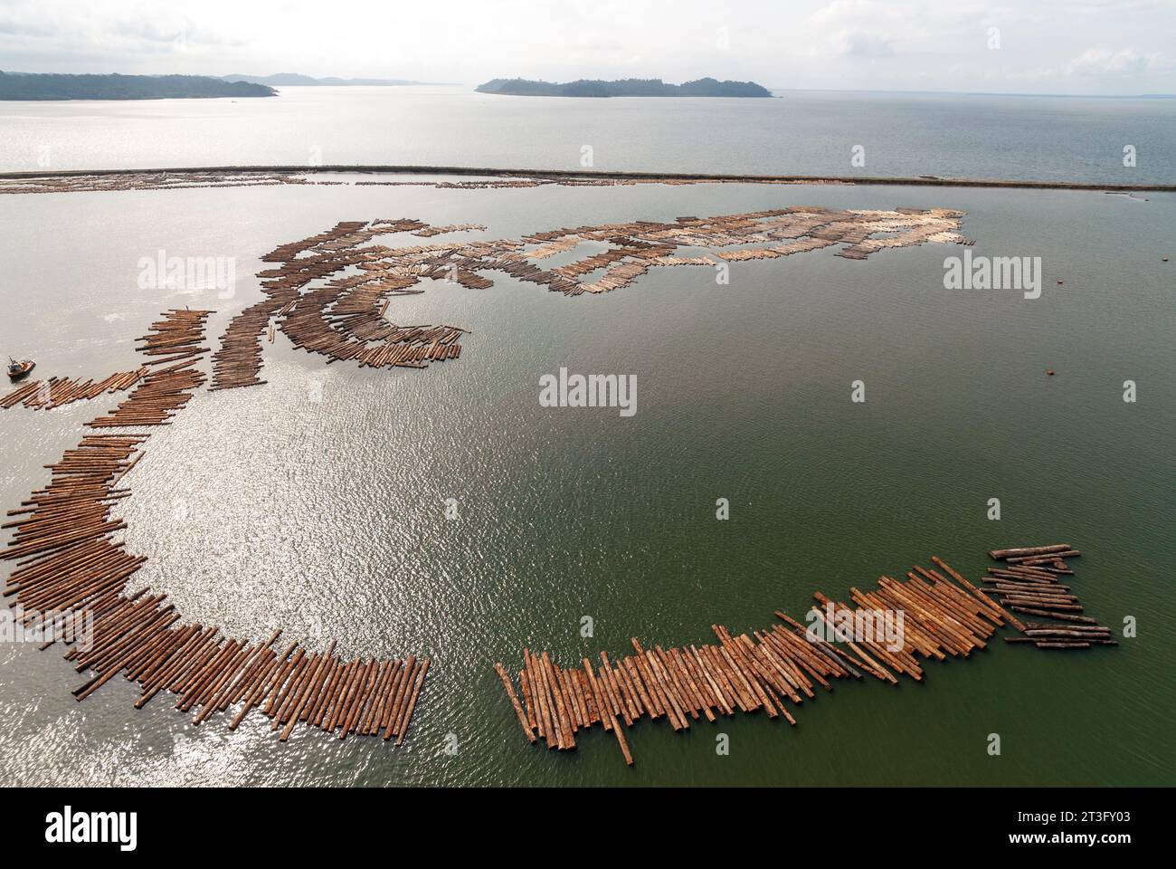 Gabon, Libreville, estuaire District, wood industry, wood floating ...