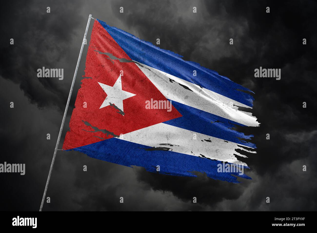 Cuba torn flag on dark sky background Stock Photo - Alamy