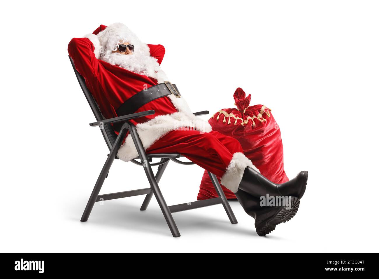 Santa claus wearing sunglasses and enjoying in a foldable chair ...