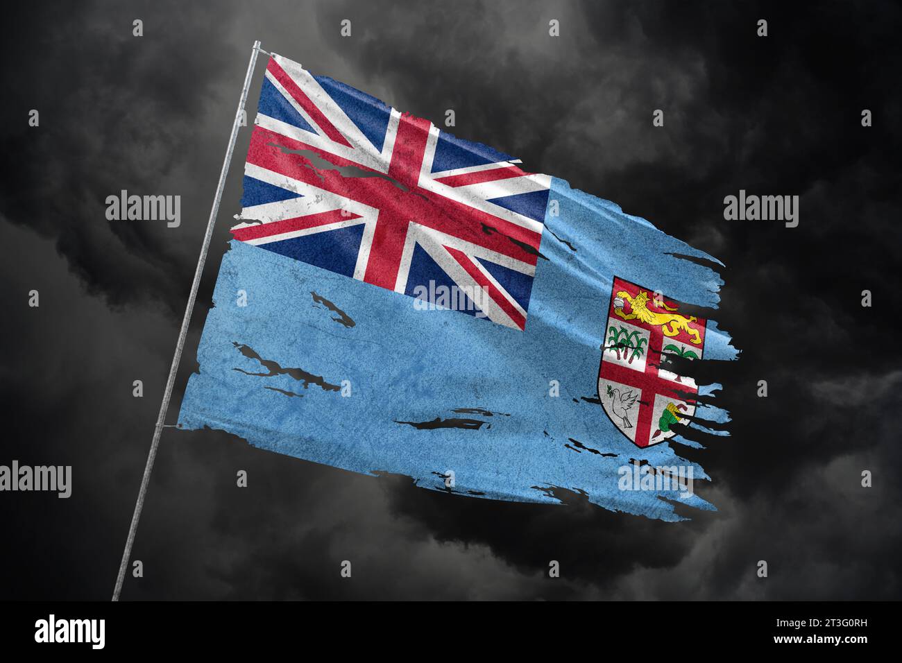 Fiji torn flag on dark sky background Stock Photo - Alamy