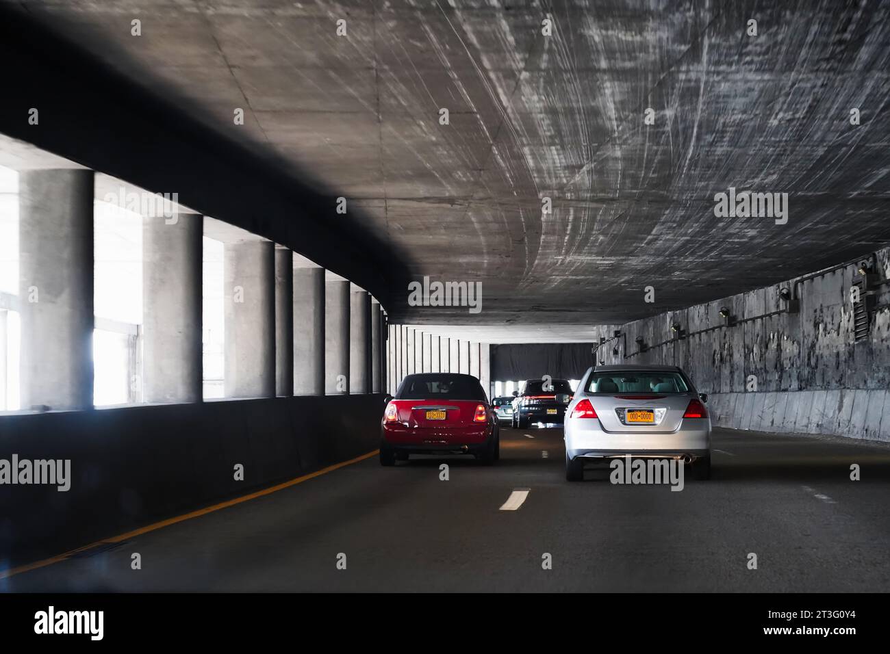 Driving through concrete tunnels on New York City's FDR Drive Stock ...