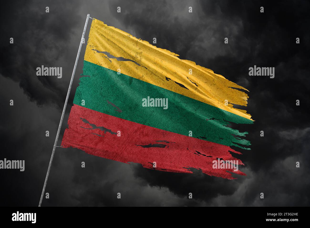 Lithuania torn flag on dark sky background Stock Photo - Alamy