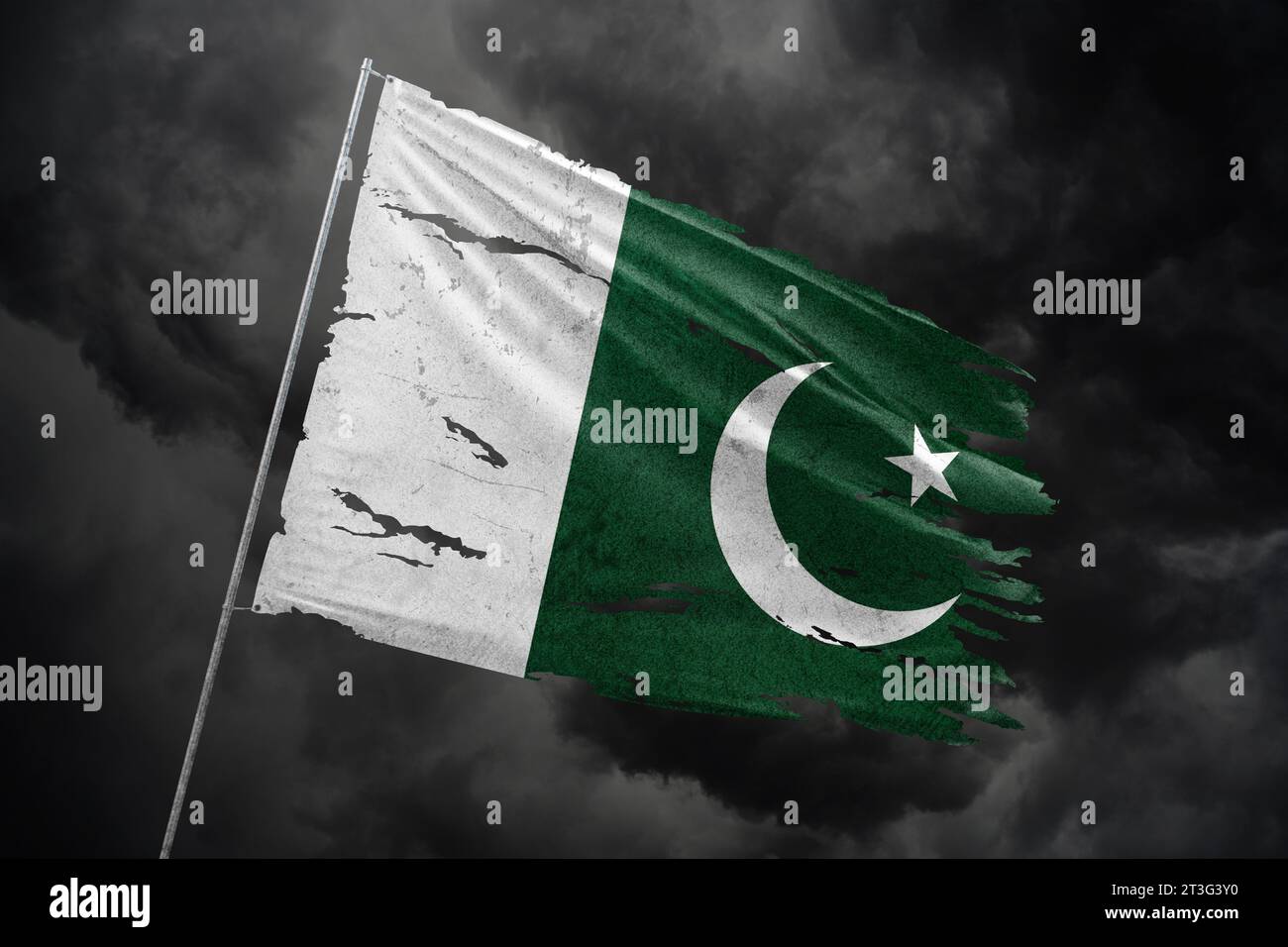 Pakistan torn flag on dark sky background Stock Photo - Alamy