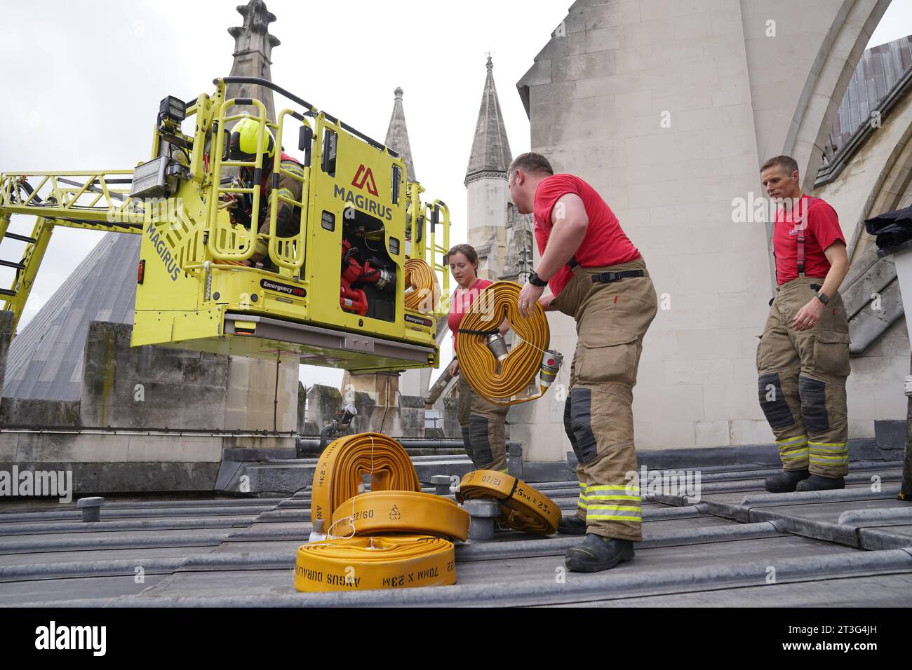 Firefighters from the London Fire Brigade's Lambeth and Soho stations ...