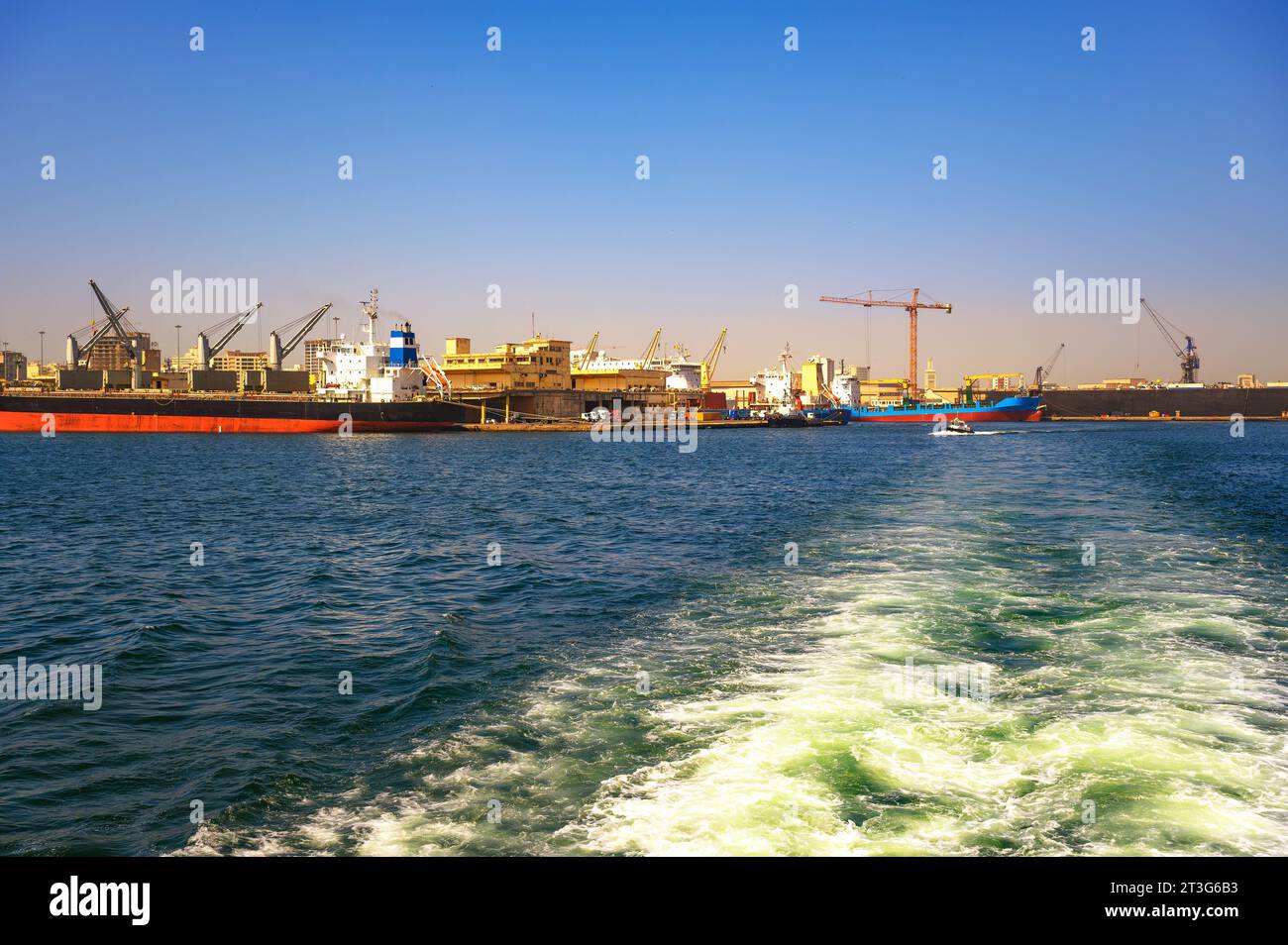 Port of Dakar in Senegal with big cargo ships, cranes and heavy cargo ...